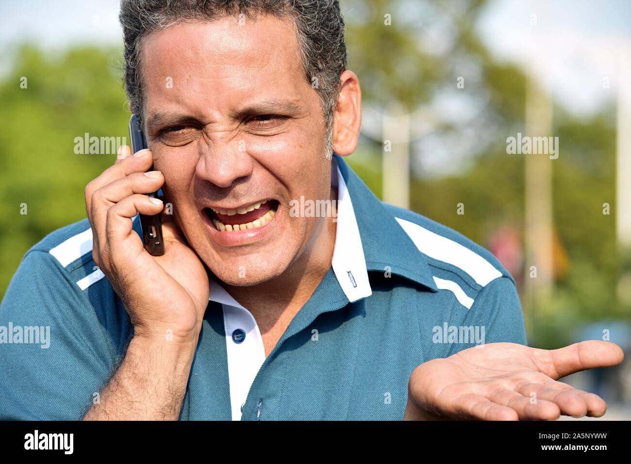 Man unhappy telephone hi-res stock photography and images - Alamy