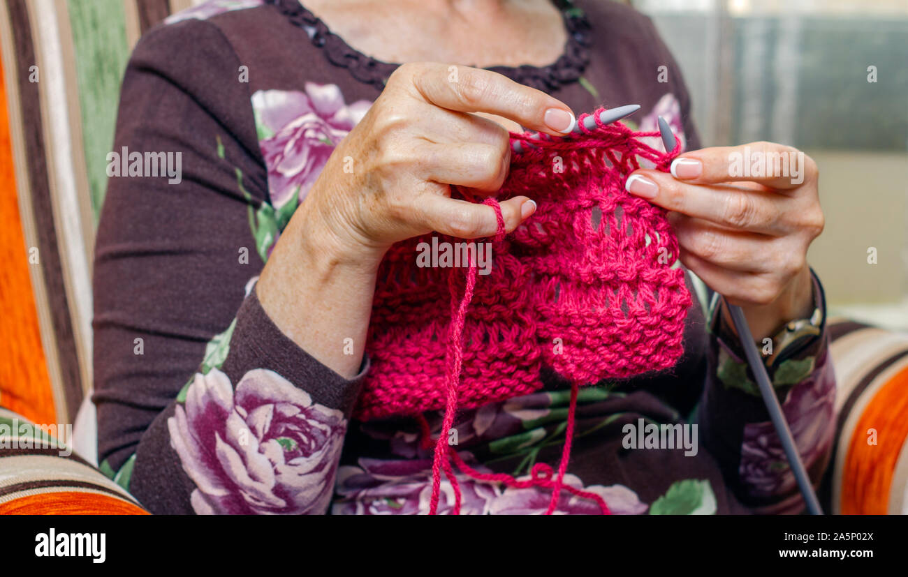 Mature woman knitting yarn hi-res stock photography and images - Alamy