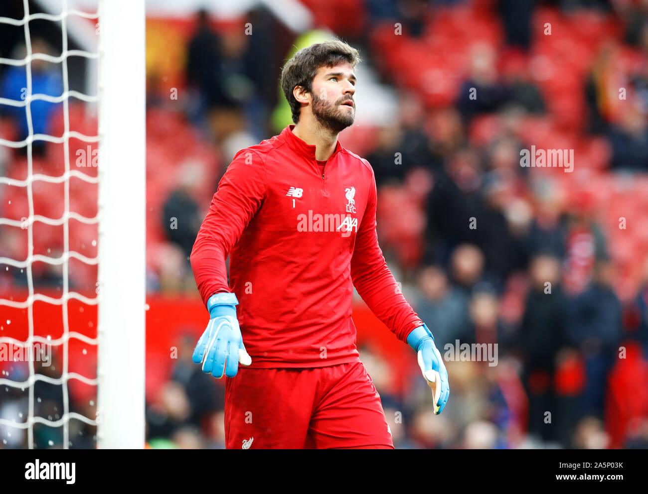 Liverpool goalkeeper Alisson warms up before the Premier League match ...