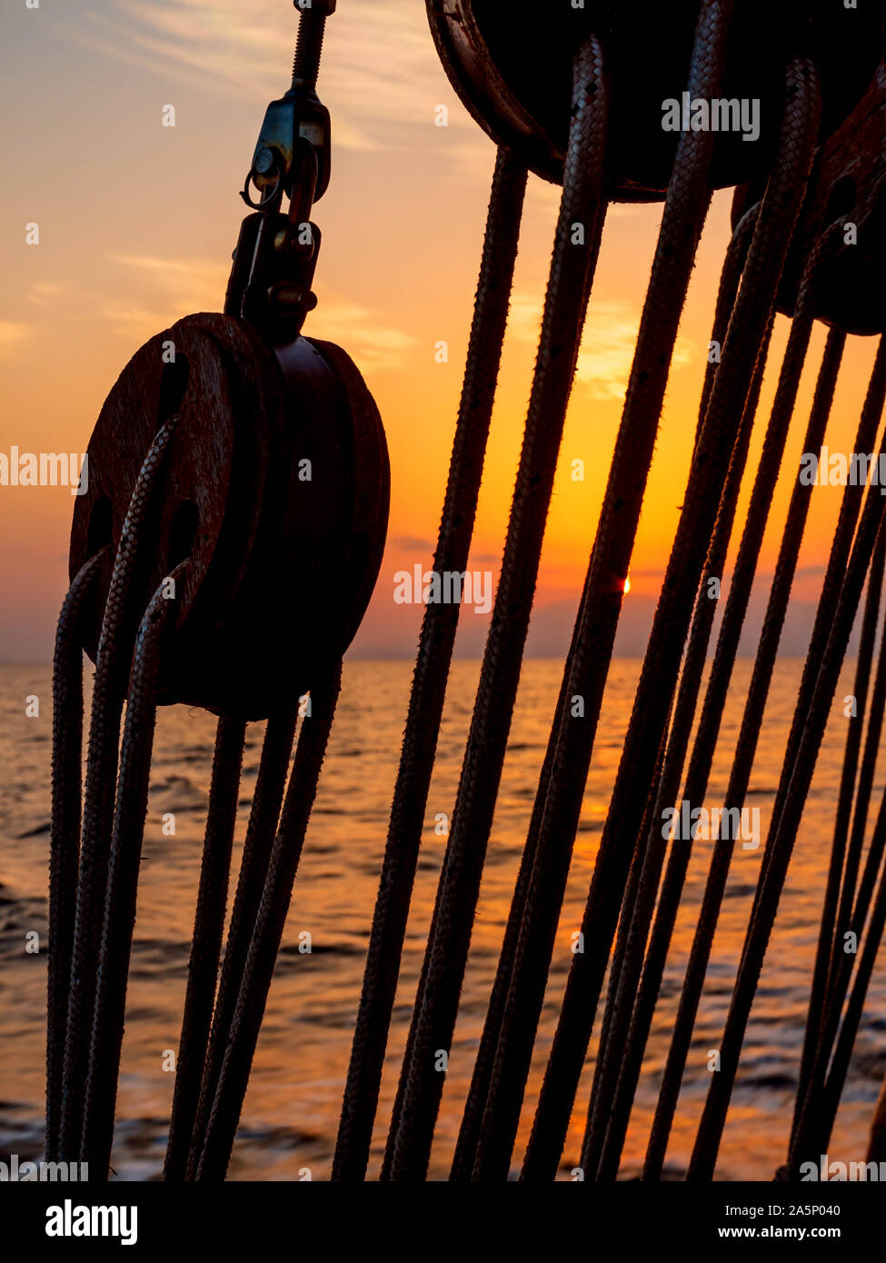 Sunset at the Sailboat deck while cruising in the Cyclades in Greece ...