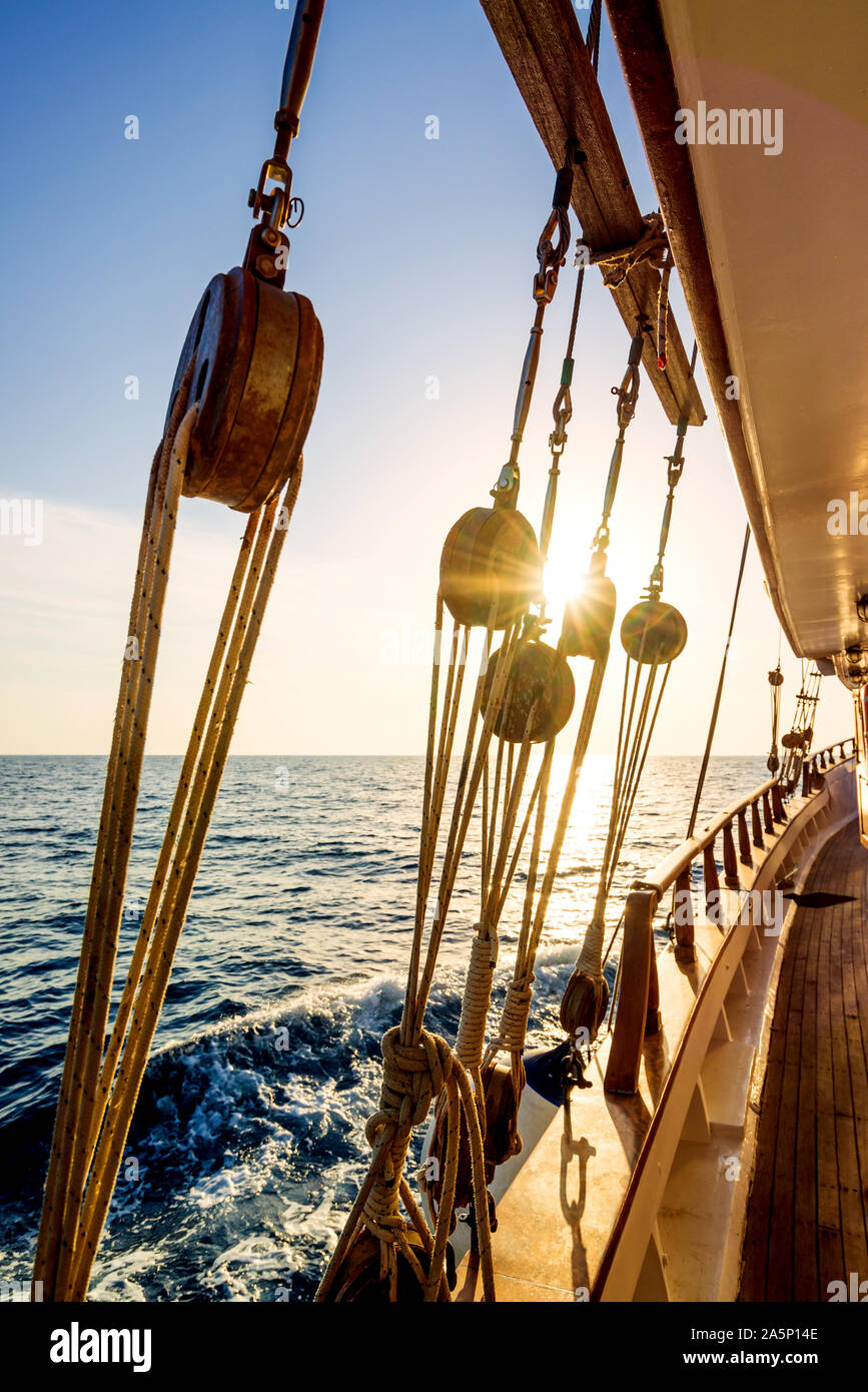 Sunset at the Sailboat deck while cruising in the Cyclades in Greece ...