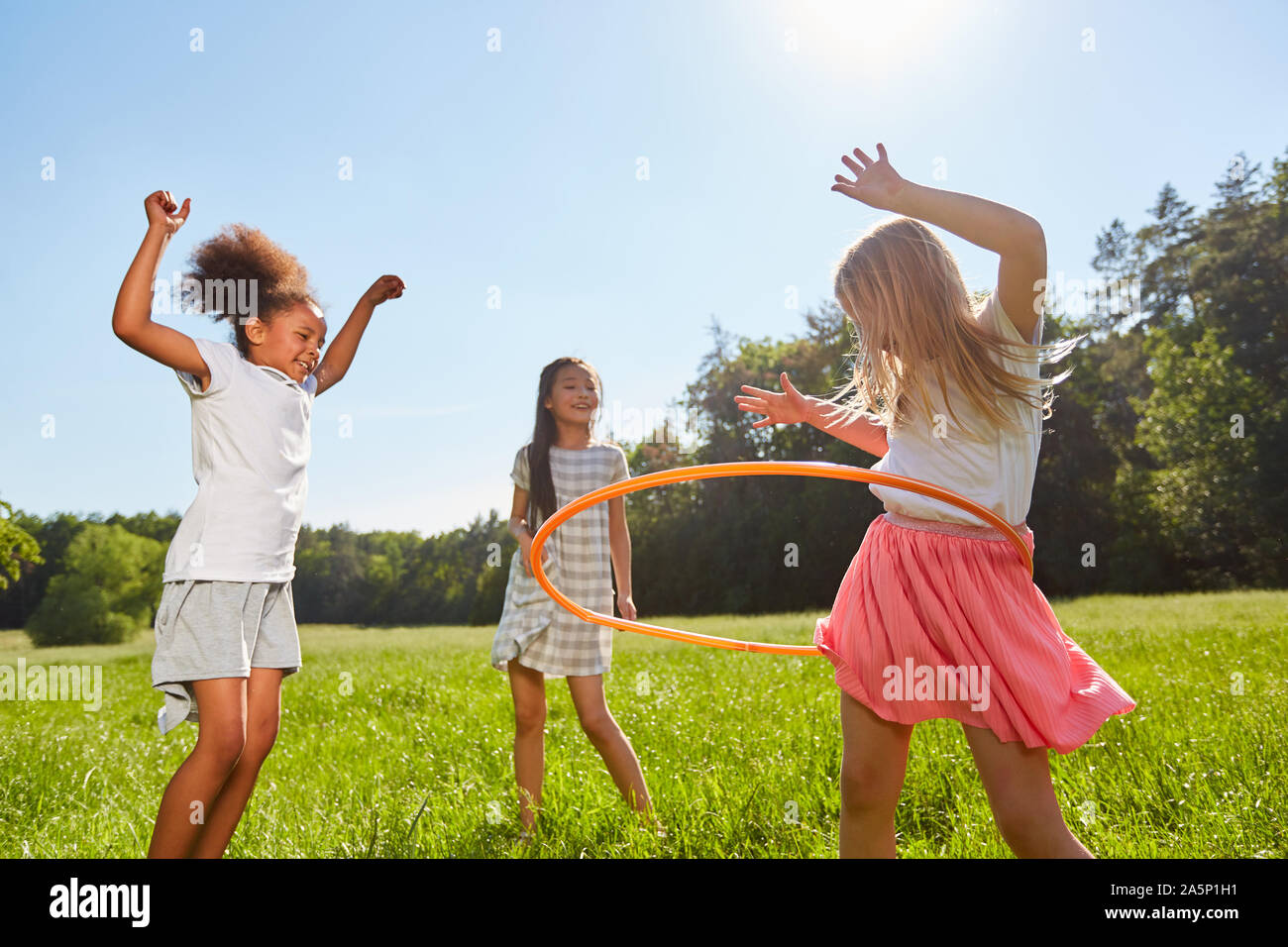 Kids in kindergarten with hoops hi-res stock photography and images - Alamy