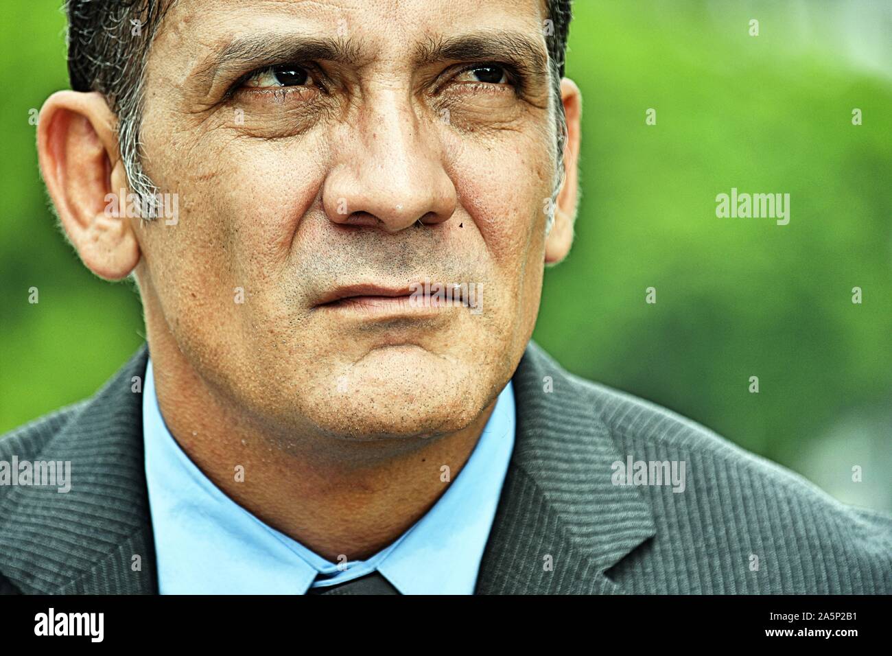 Suspicious Diverse Business Man Wearing Business Suit Stock Photo - Alamy Suspicious Diverse Business Man Wearing Business Suit Stock Photo - Alamy