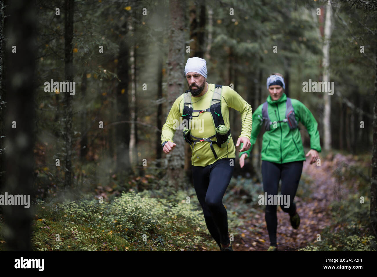 Man and woman running forward hi-res stock photography and images - Alamy
