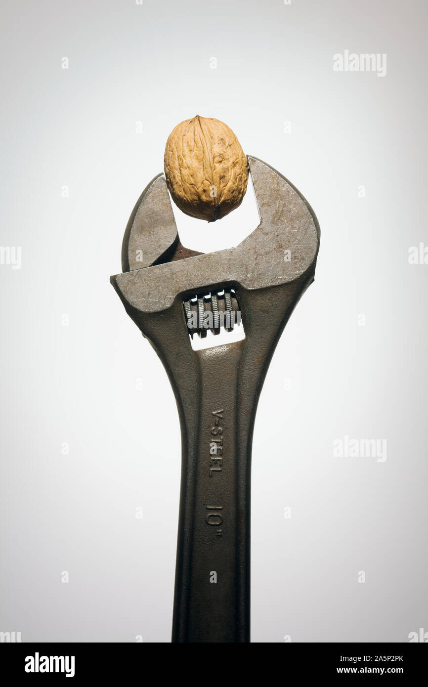 Wrench with nut Stock Photo - Alamy