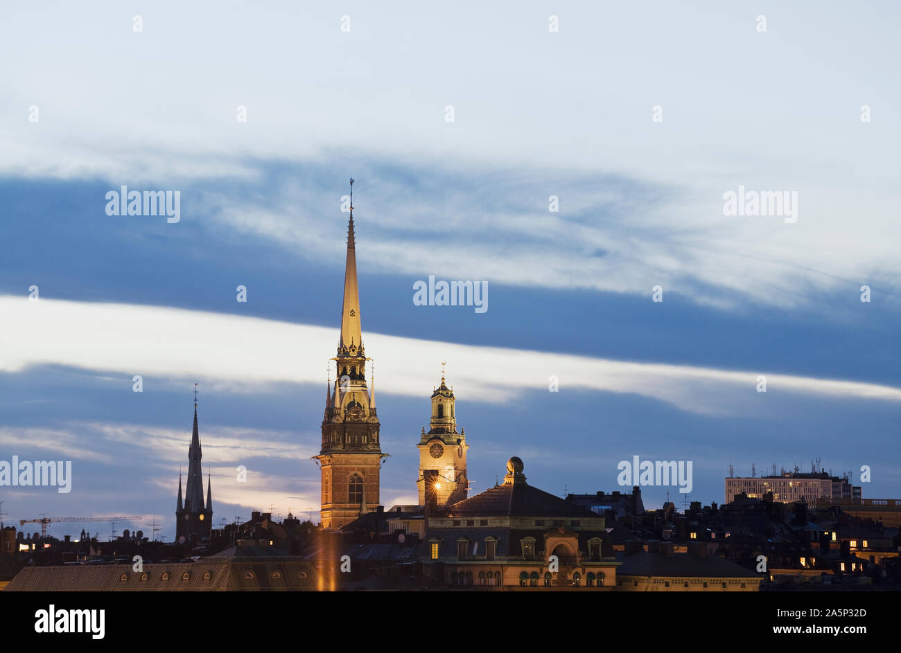 Illuminated towers of church Stock Photo - Alamy