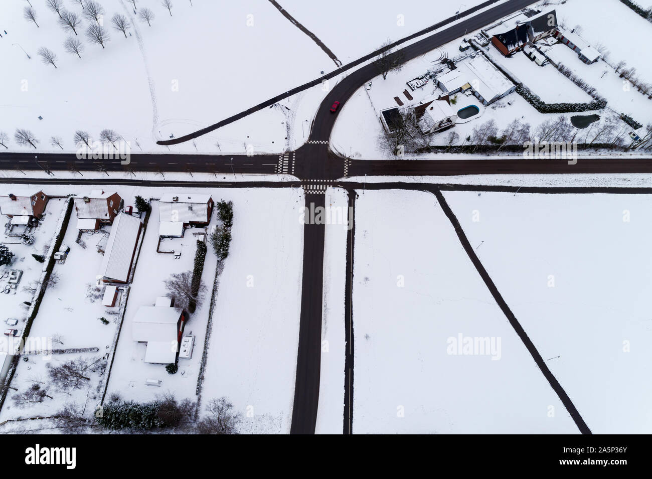 Aerial view of road junction in winter Stock Photo - Alamy