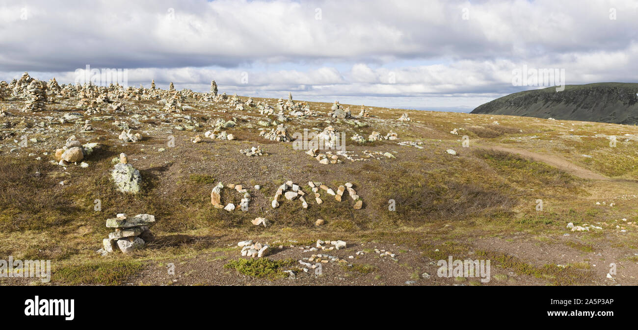 Sign made of rocks Stock Photo - Alamy