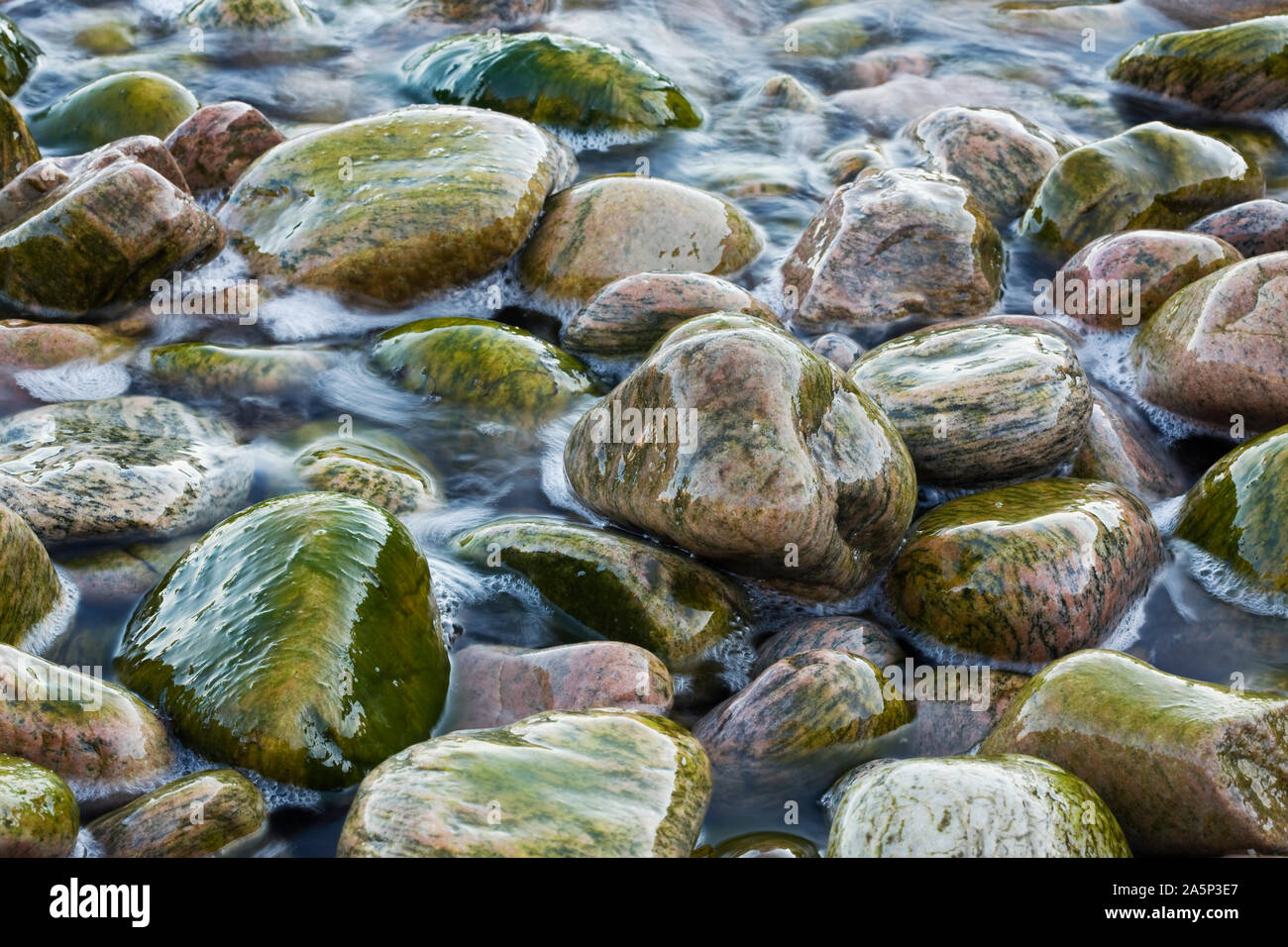 Rocks in water Stock Photo - Alamy