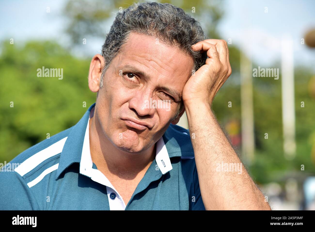 Confused Latino Male Stock Photo - Alamy