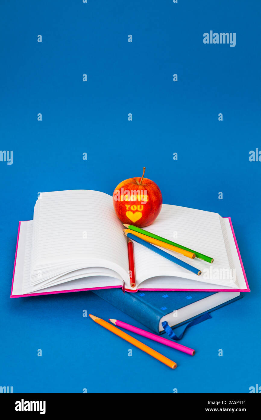 Books pencils apple on hi-res stock photography and images - Alamy