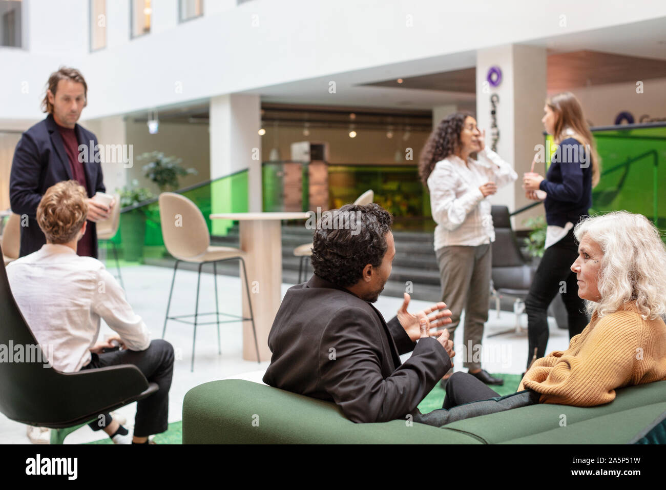 Coworkers together hi-res stock photography and images - Alamy