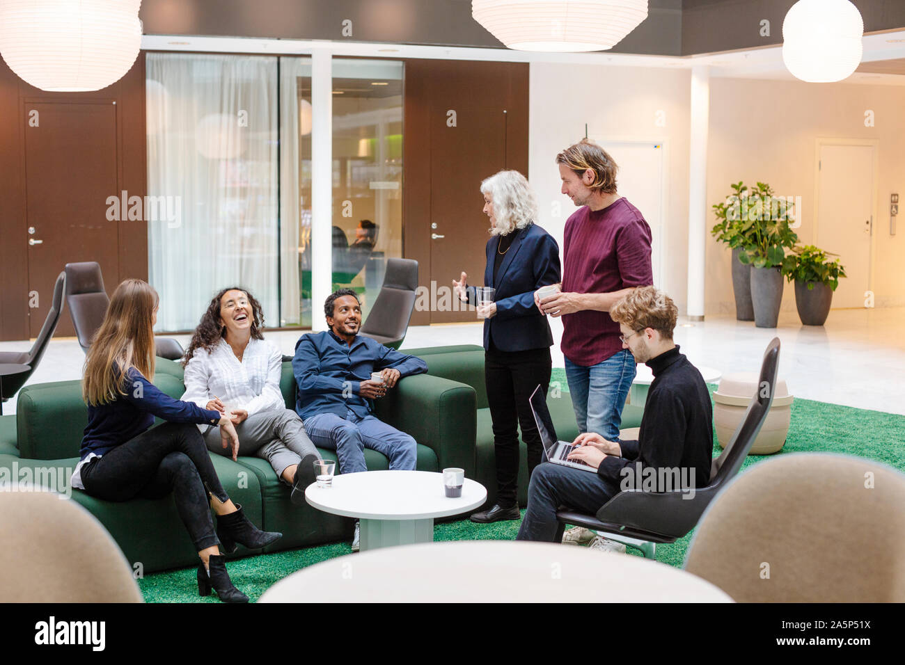 Coworkers together hi-res stock photography and images - Alamy