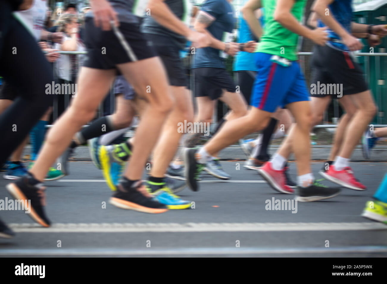 Marathon runners, running on the city road Stock Photo - Alamy