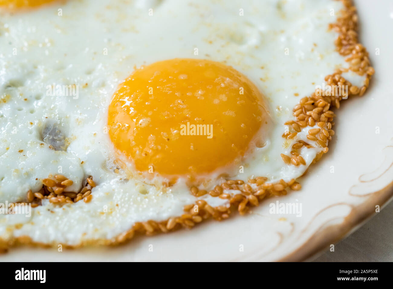 Sesame Seeds with Fried Eggs for Breakfast. Organic Food Stock Photo ...
