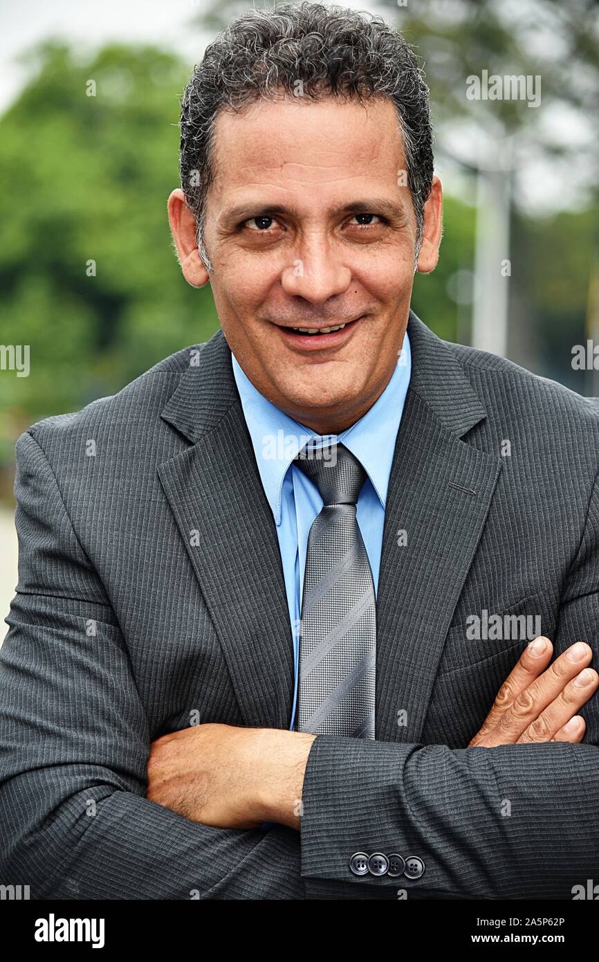Successful Latino Businessman Wearing Suit And Tie Stock Photo - Alamy