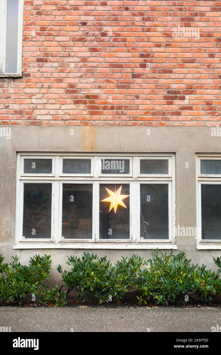 Window with illuminated star Stock Photo - Alamy