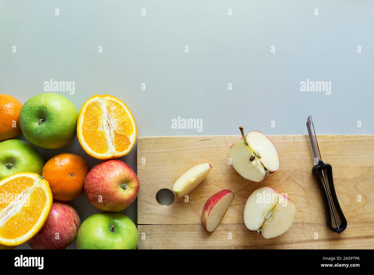 Fruits on grey background Stock Photo - Alamy