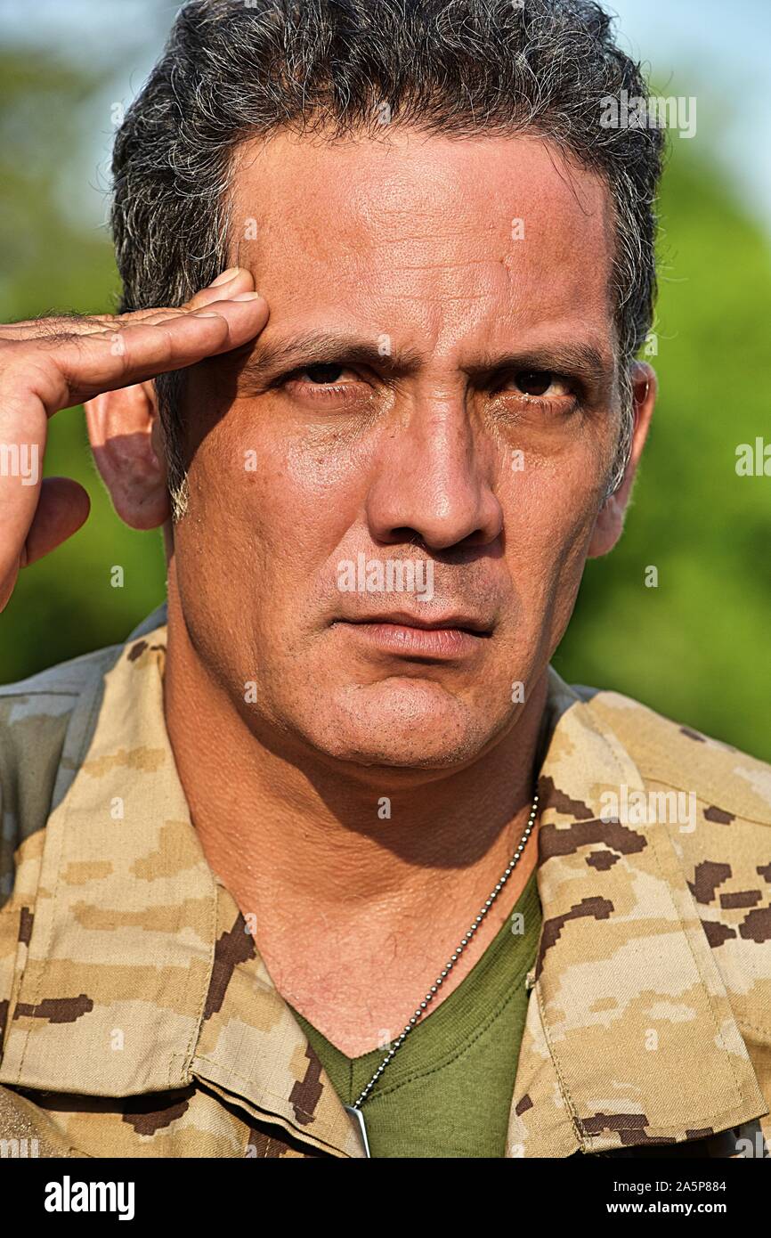Hispanic Male Soldier Saluting Stock Photo - Alamy