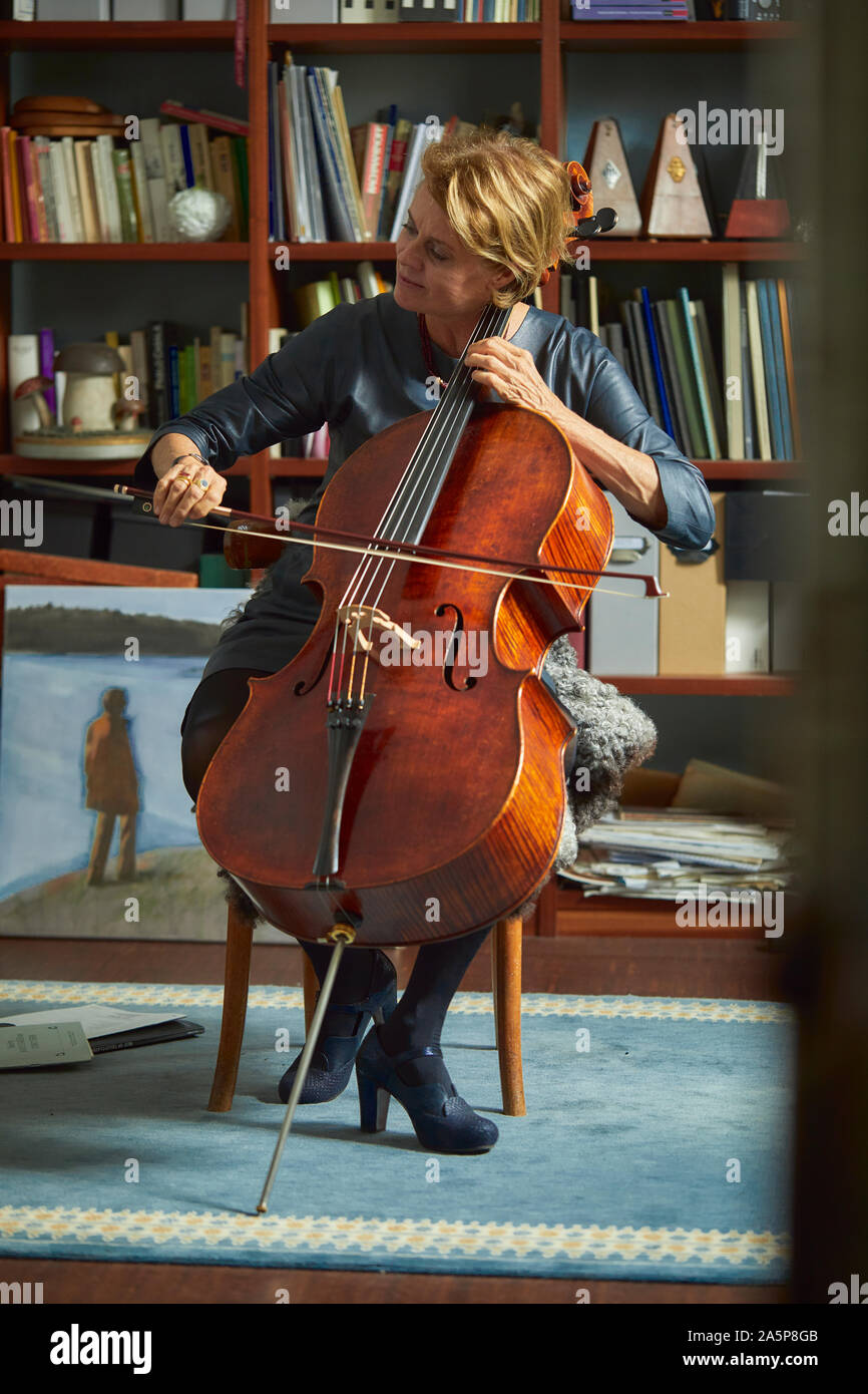 Full length woman cello hi-res stock photography and images - Alamy