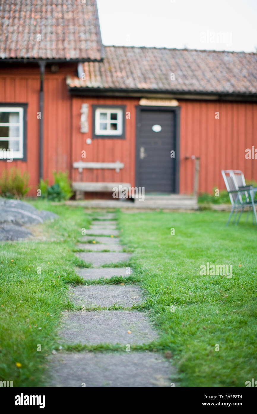 Path leading to wooden house Stock Photo - Alamy