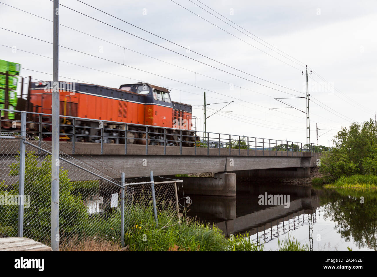Train on train bridge Stock Photo - Alamy