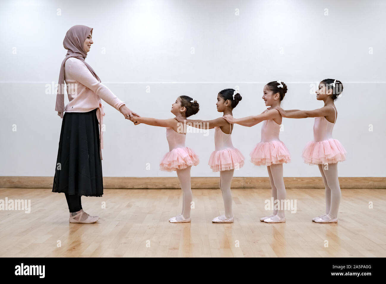 Muslim women teacher british hi-res stock photography and images - Alamy