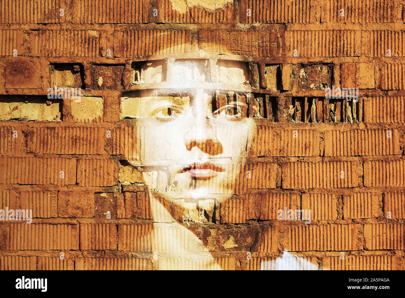 Dramatic portrait of man against brick wall. double exposure. texture ...