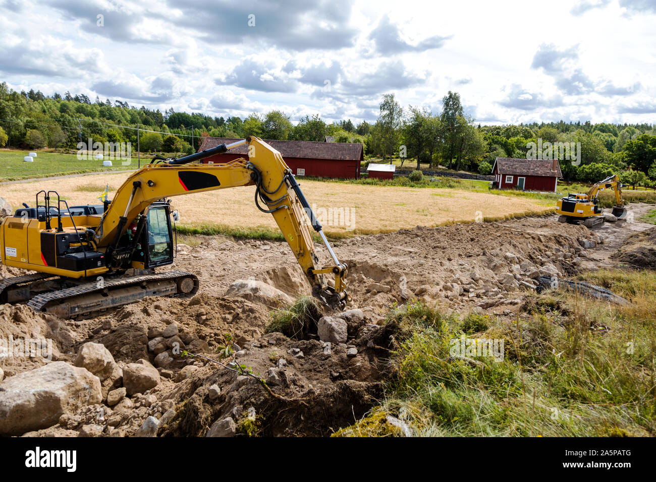 Digger at work Stock Photo - Alamy
