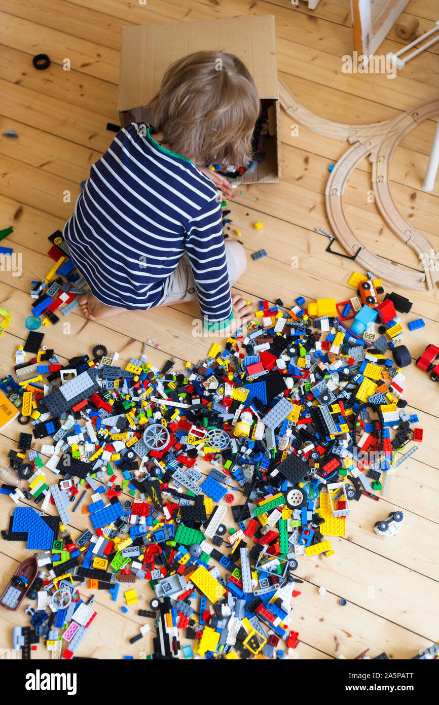 Boy playing Lego Stock Photo - Alamy