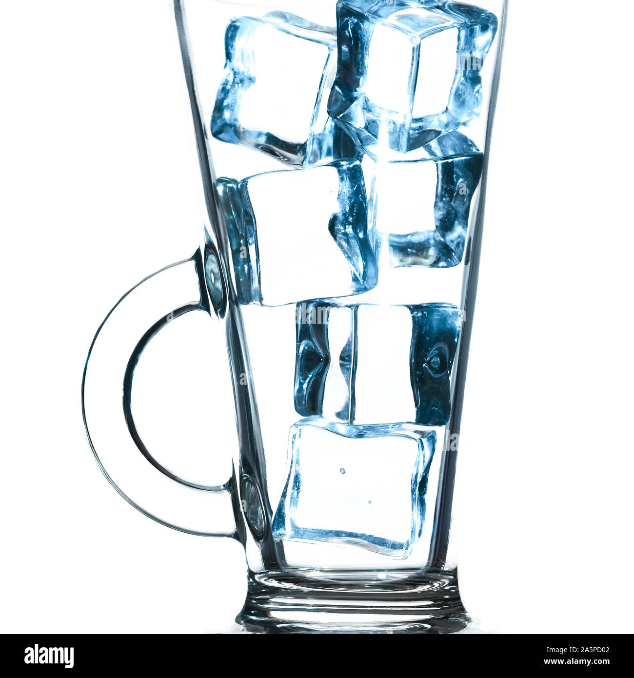 Glass with ice cubes. Isolated on white Stock Photo - Alamy