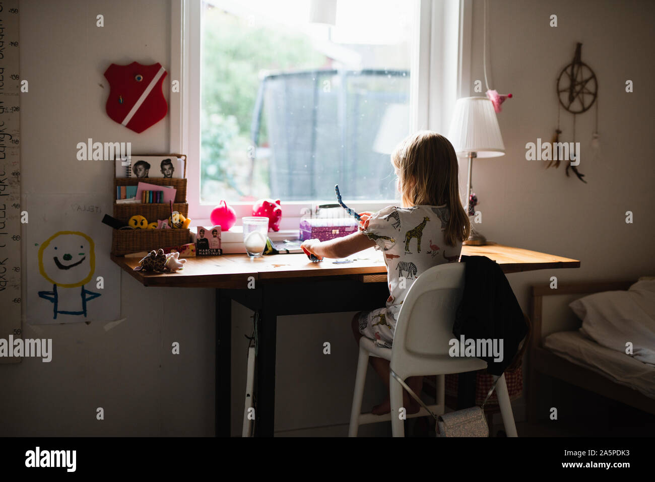 Girl chair rear hi-res stock photography and images - Alamy