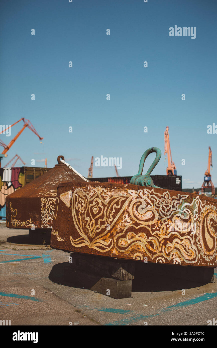 Rusty weights in port Stock Photo - Alamy