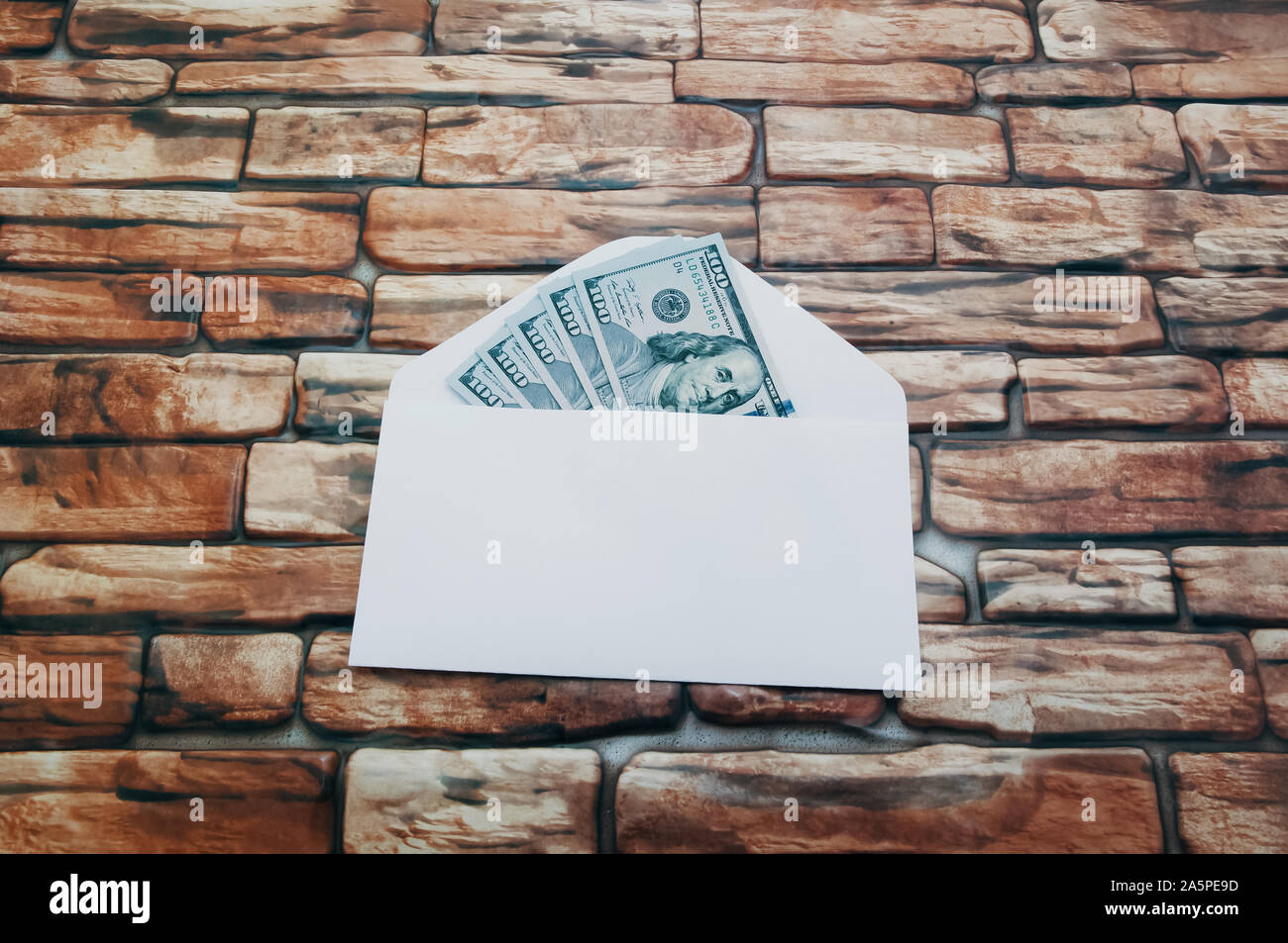 Hundred dollar bills in envelope hi-res stock photography and images ...