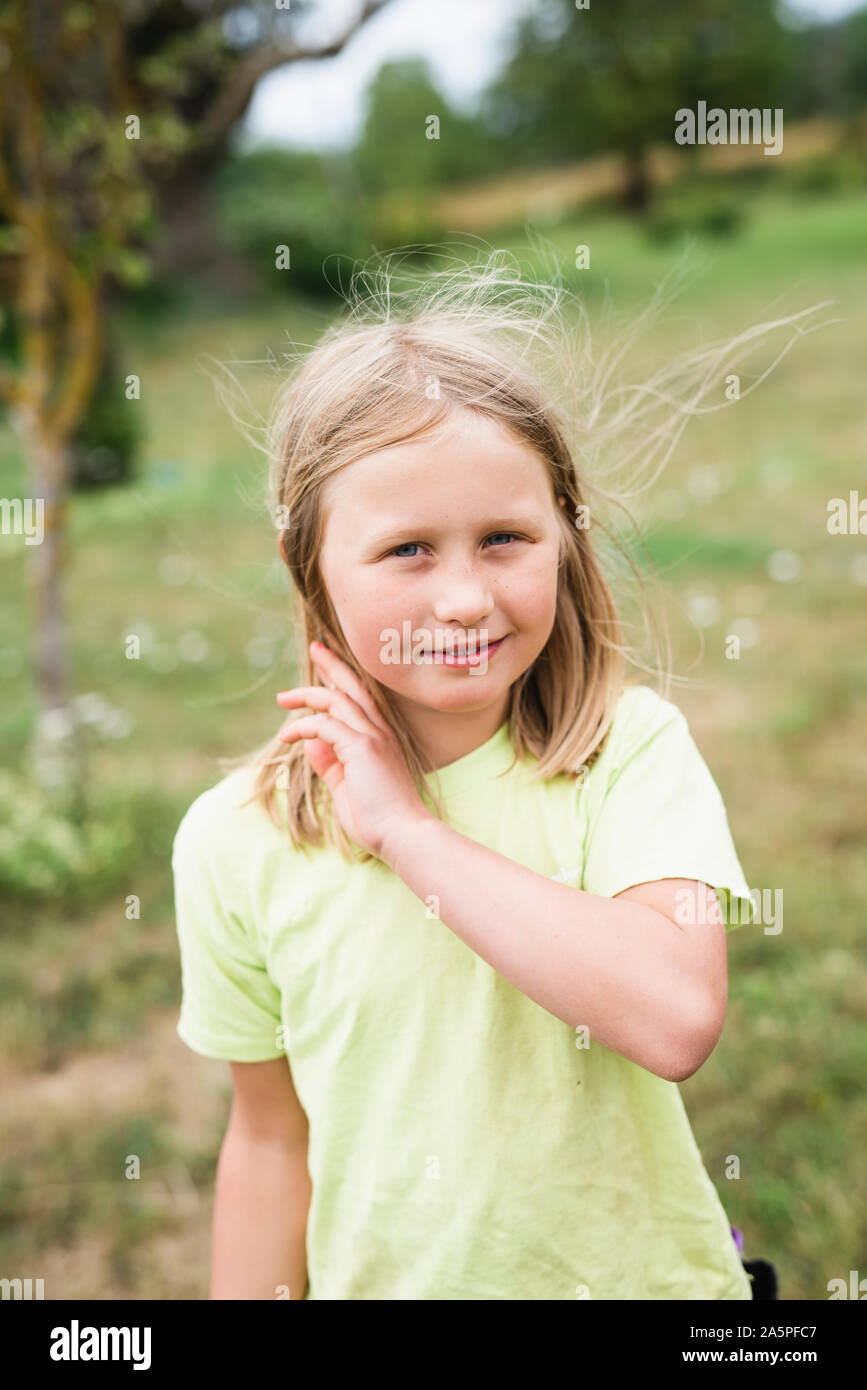 Girl standing outside Stock Photo - Alamy