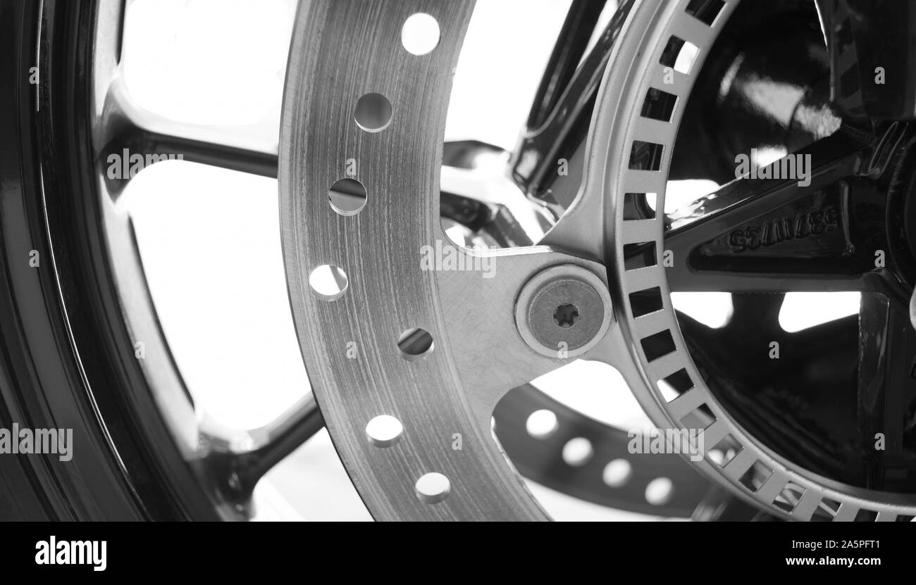 Black and white of motorcycle front wheel and brake rotor Stock Photo ...