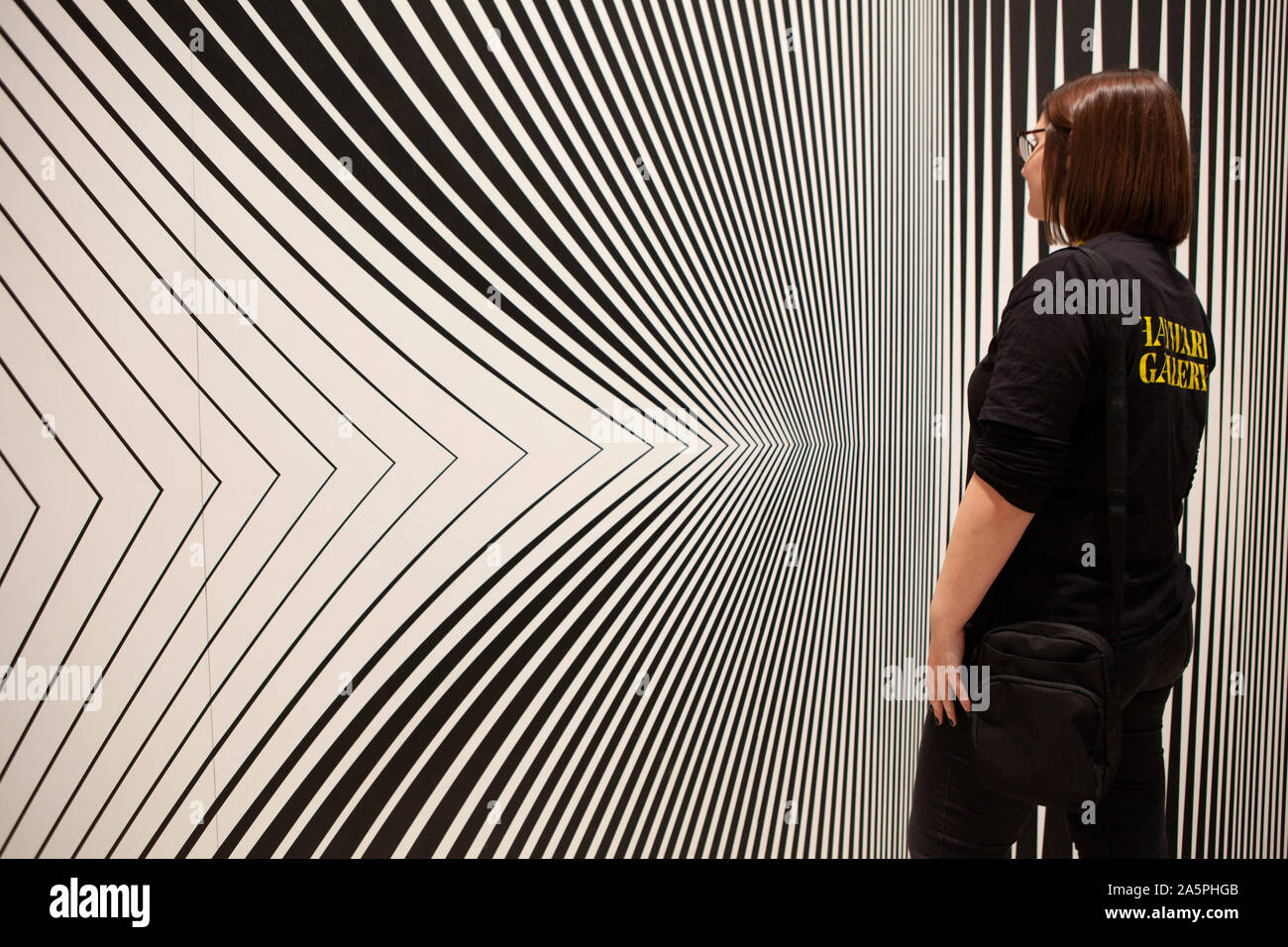 A gallery attendant studies 'Continuum [Reconstruction] 1963/2005', the ...