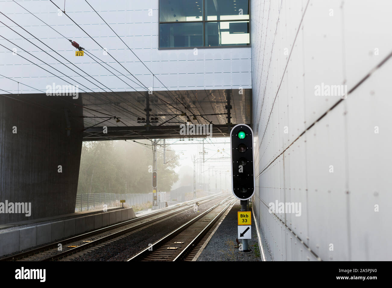 Green light on train track Stock Photo - Alamy