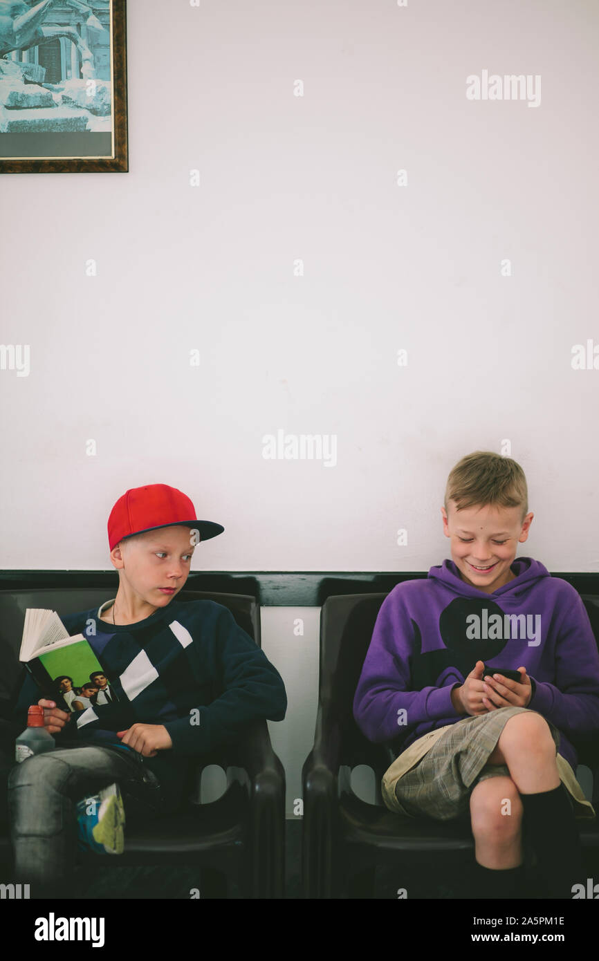 Boys waiting hi-res stock photography and images - Alamy