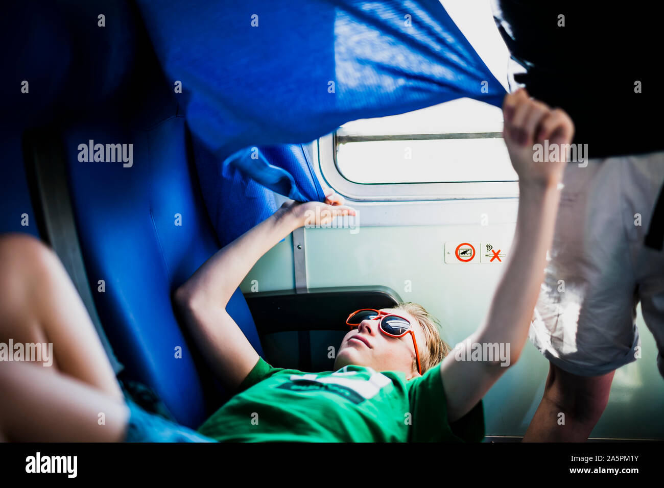 Boy in train hi-res stock photography and images - Alamy