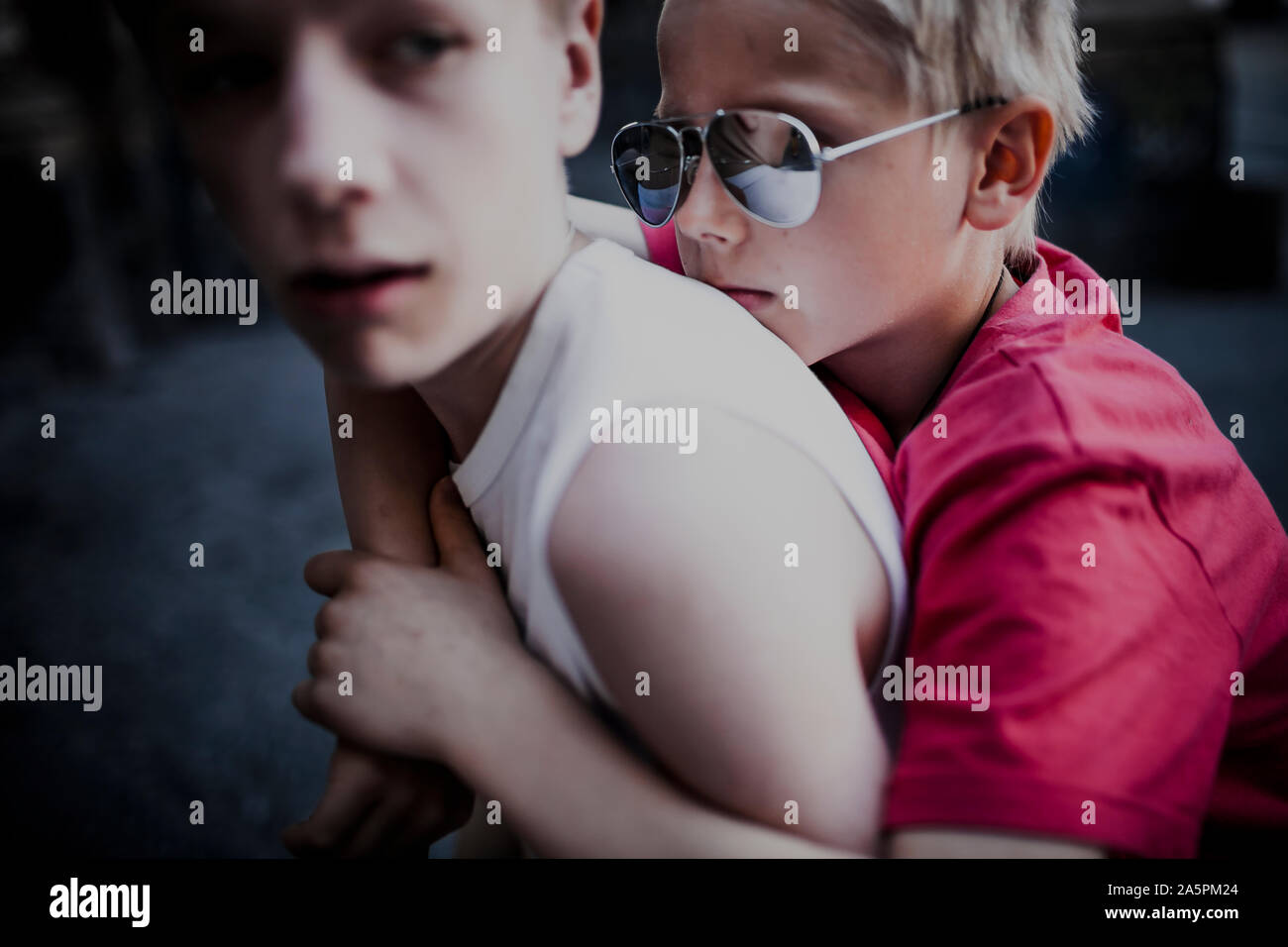 Piggyback brothers hi-res stock photography and images - Alamy