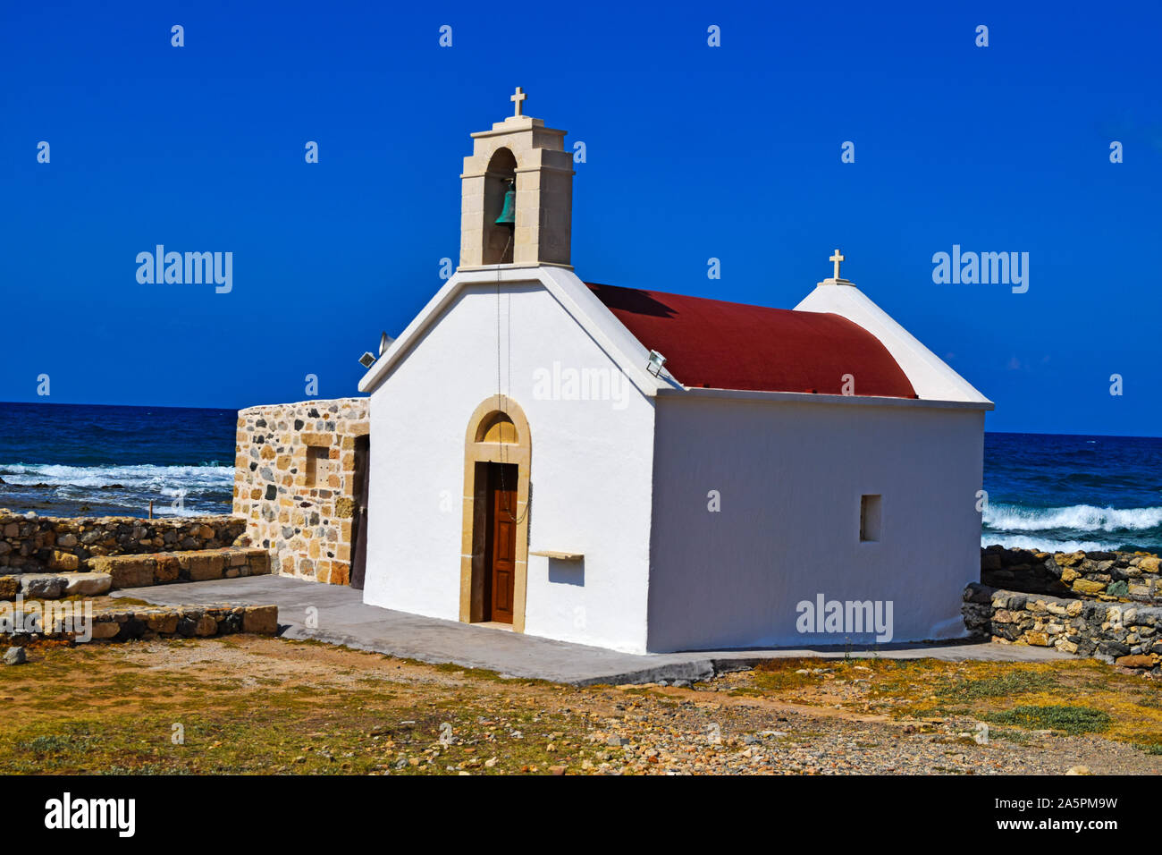 Beautiful white small church by the sea in Chersonissos on the island ...