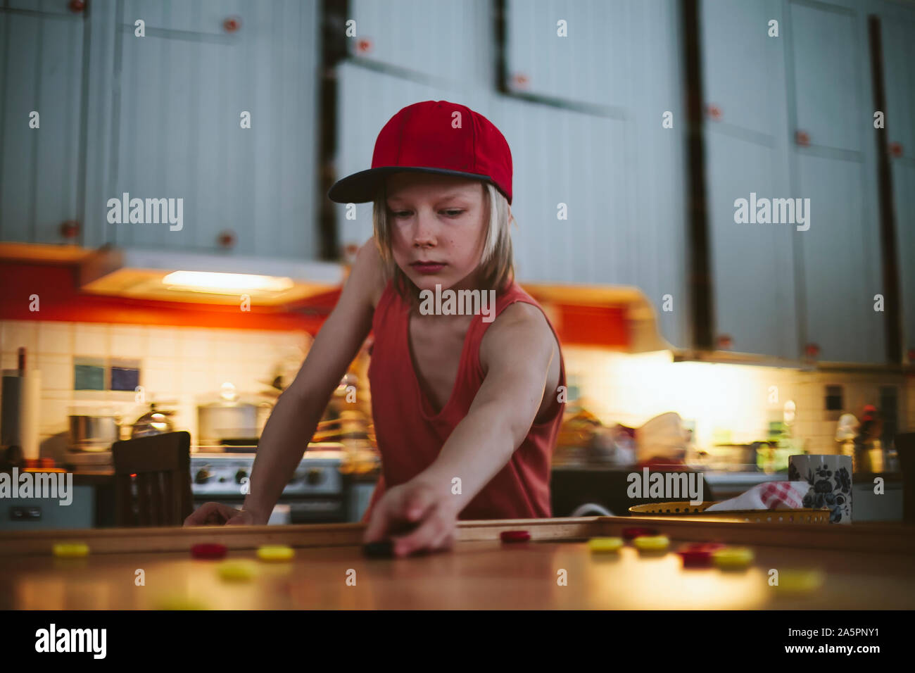 Boy playing table hi-res stock photography and images - Alamy
