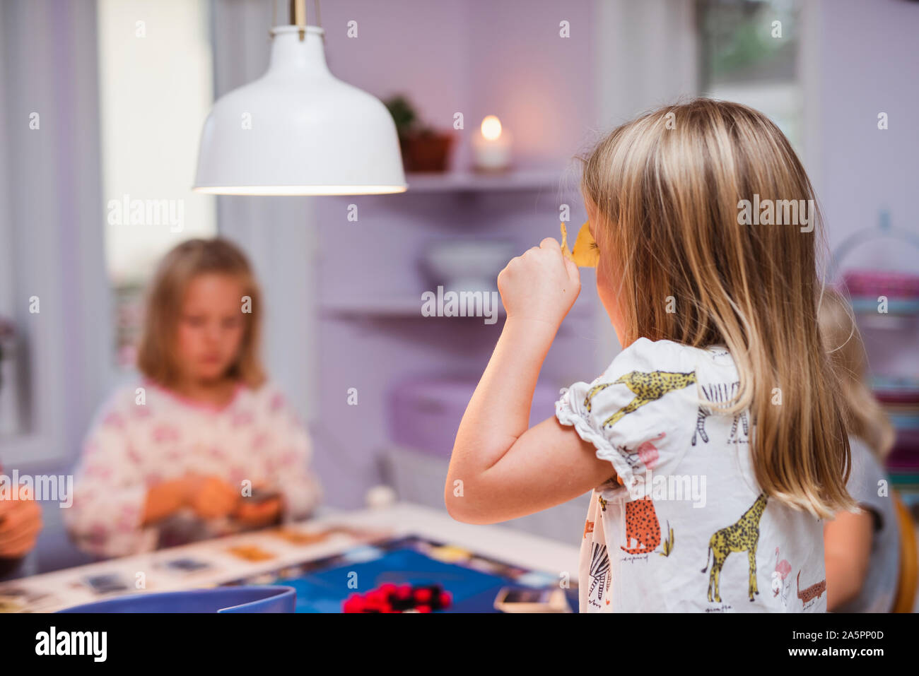 Girls playing board game hi-res stock photography and images - Alamy