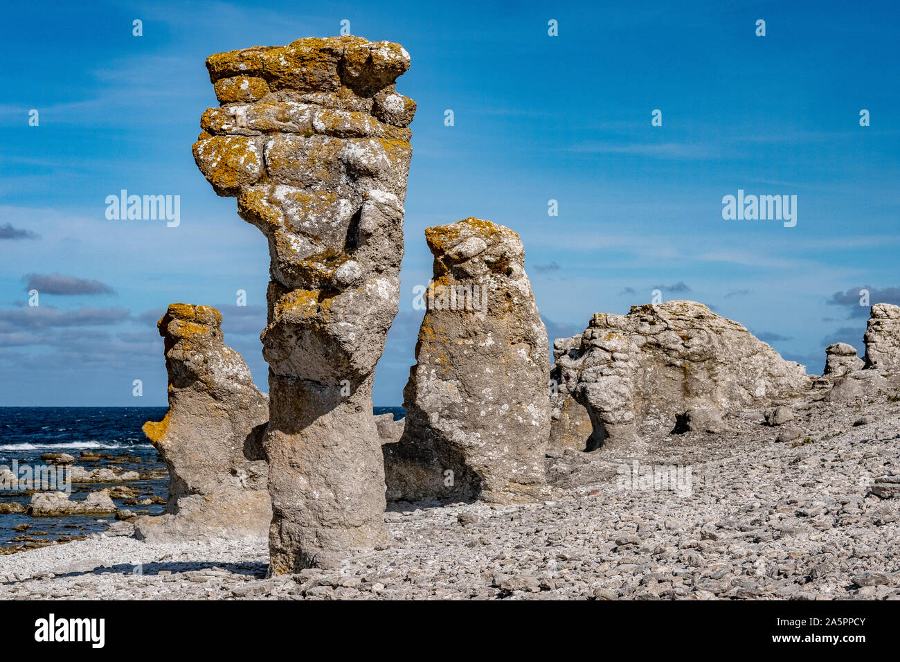 Rock formations on beach Stock Photo - Alamy