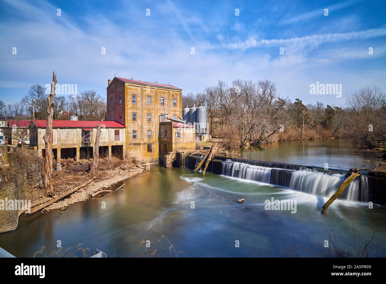 Old Flour Mill Along River Stock Photo - Alamy