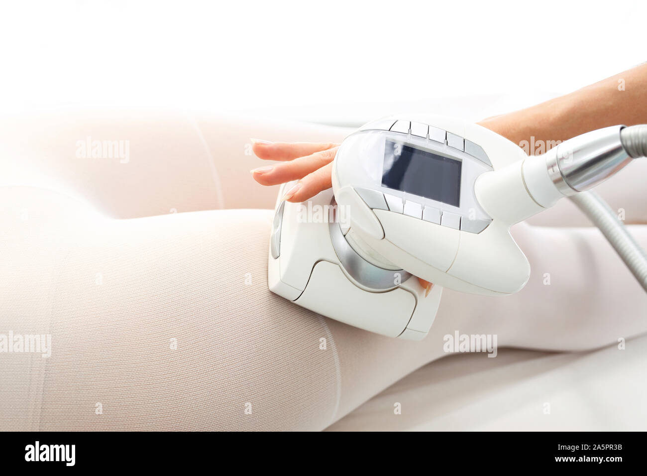 Endermology, vacuum massage using the head. Thigh treatment Stock Photo ...
