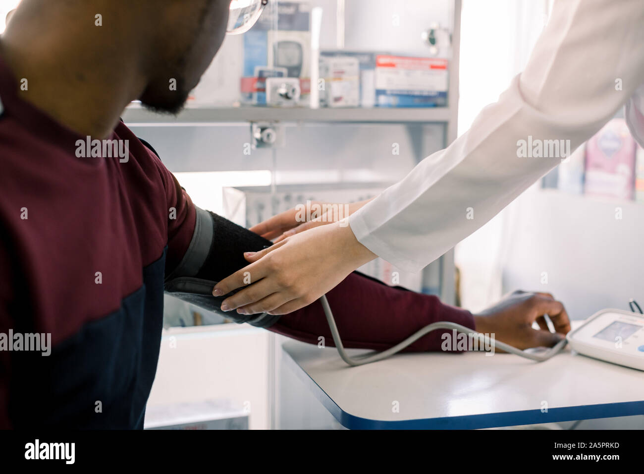 Close Up Of A Doctor Checking Blood Pressure Of A Patient. Doctor ...
