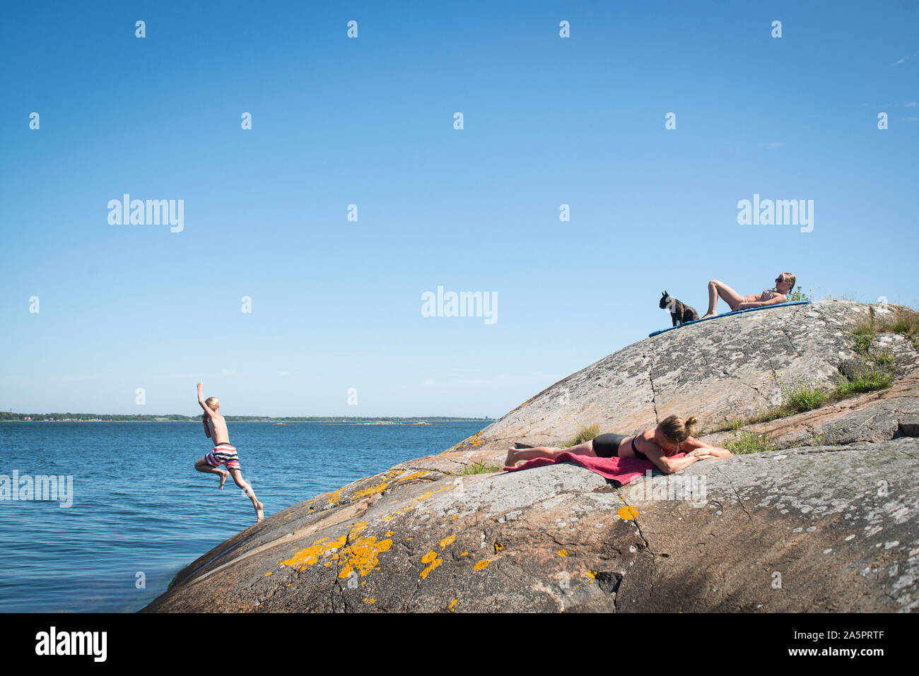 Young people at sea Stock Photo - Alamy