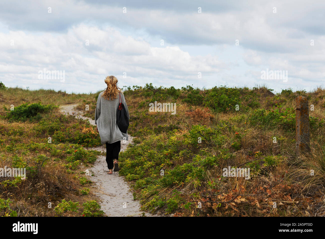 Walking rear view hi-res stock photography and images - Alamy